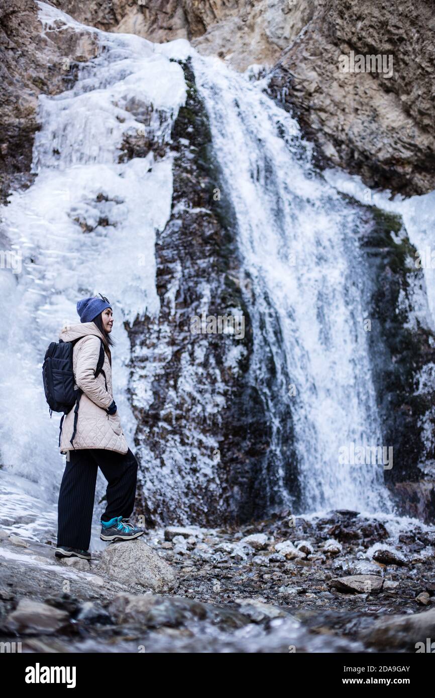 Hiking to the frozen waterfall at Issyk Ata in Kyrgyzstan's Chuy Oblast ...