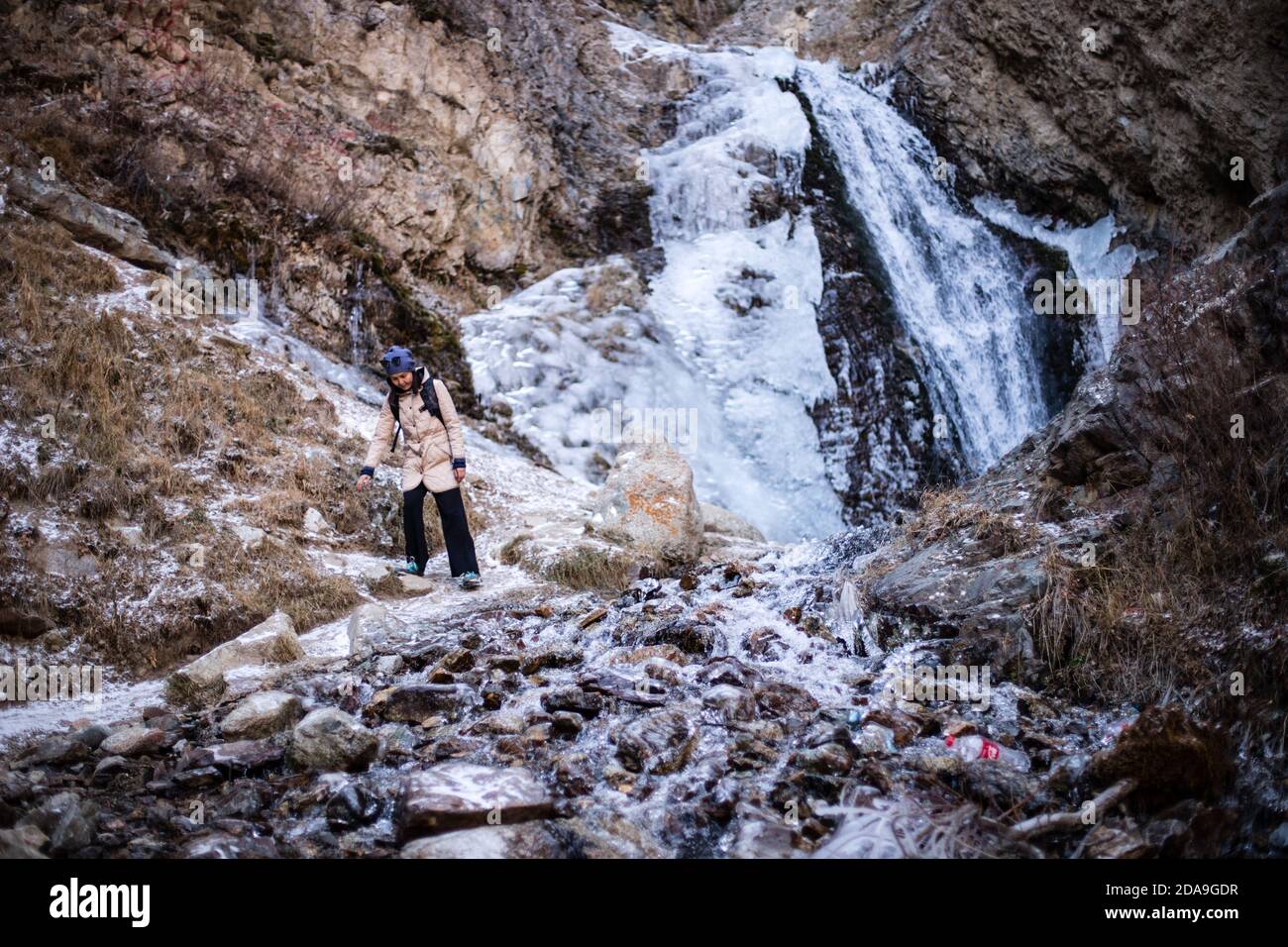 Hiking to the frozen waterfall at Issyk Ata in Kyrgyzstan's Chuy Oblast ...