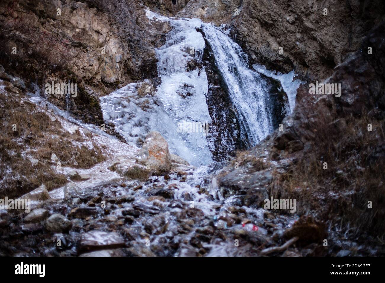 Hiking to the frozen waterfall at Issyk Ata in Kyrgyzstan's Chuy Oblast ...
