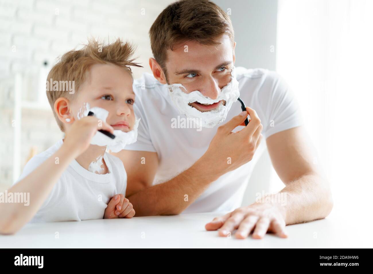Father and his little son shaving together Stock Photo - Alamy