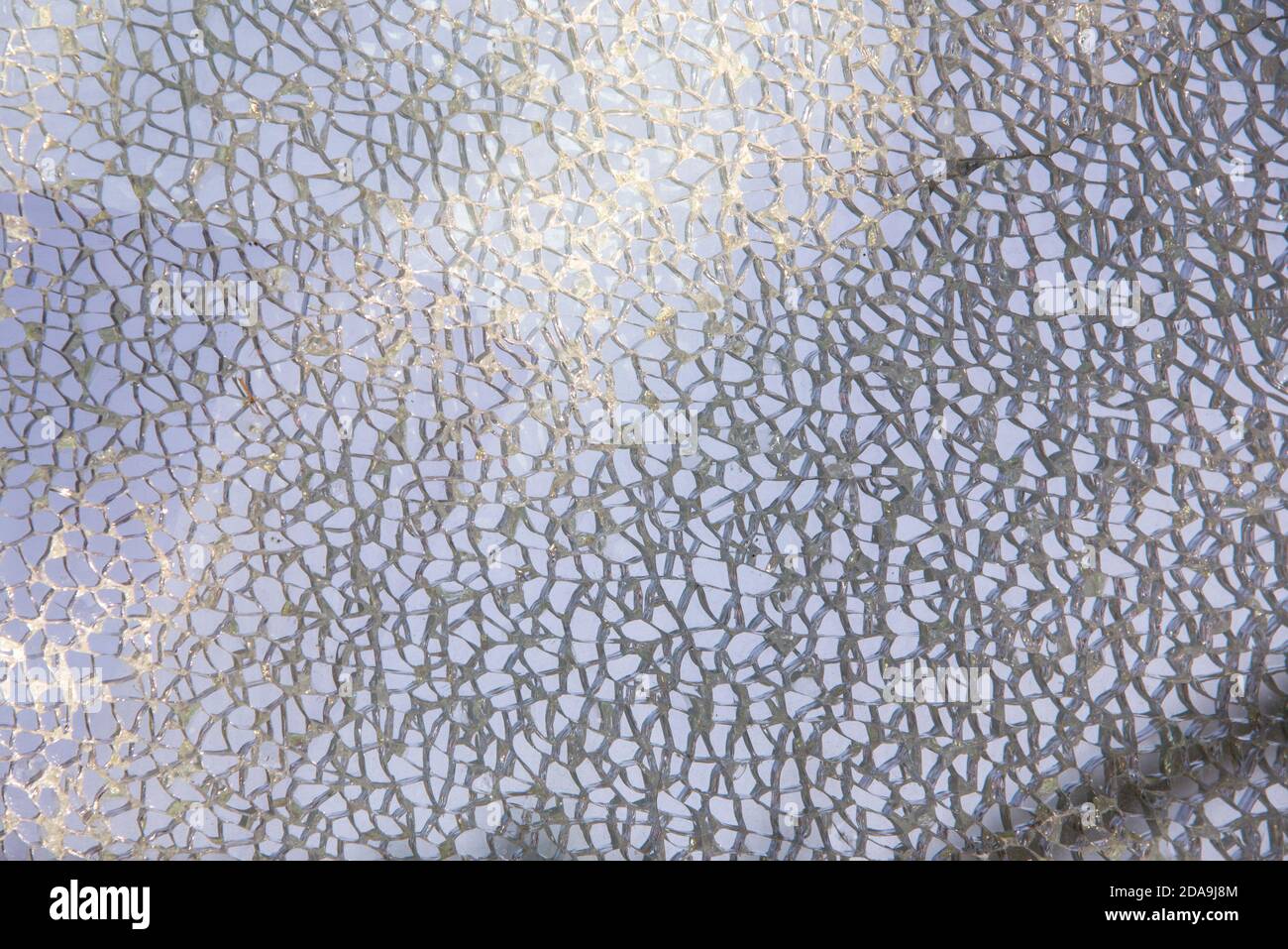 Shattered damaged pieces blue glass hi-res stock photography and images ...
