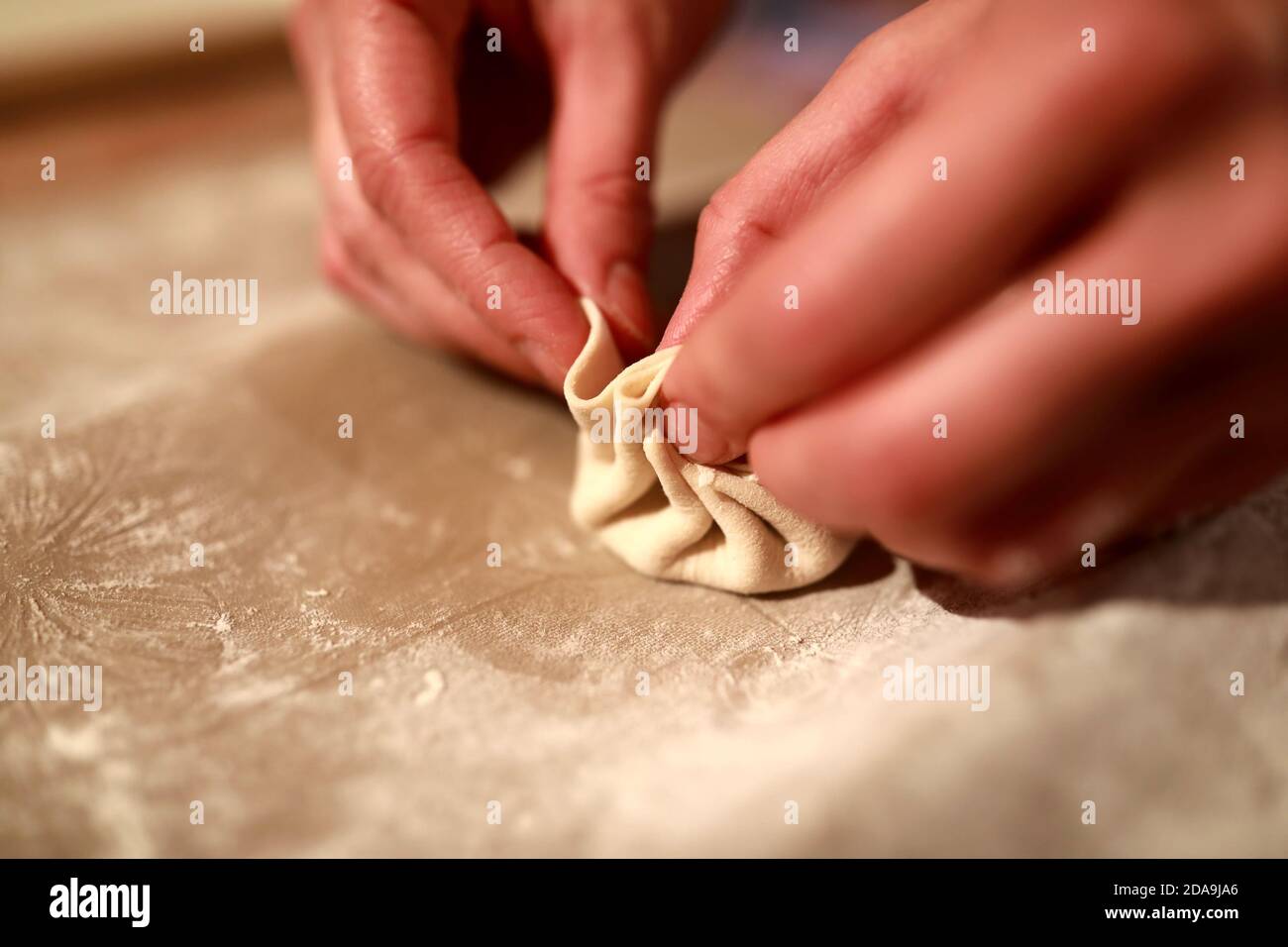 Person cooking khinkali in the kitchen, Georgia Stock Photo - Alamy