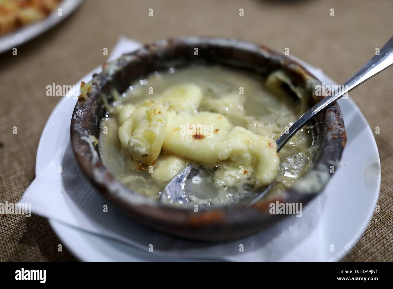 Leftover Cheese on clay plate in restaurant Stock Photo - Alamy