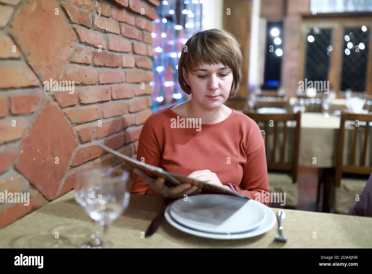 Female customer read menu hi-res stock photography and images - Alamy
