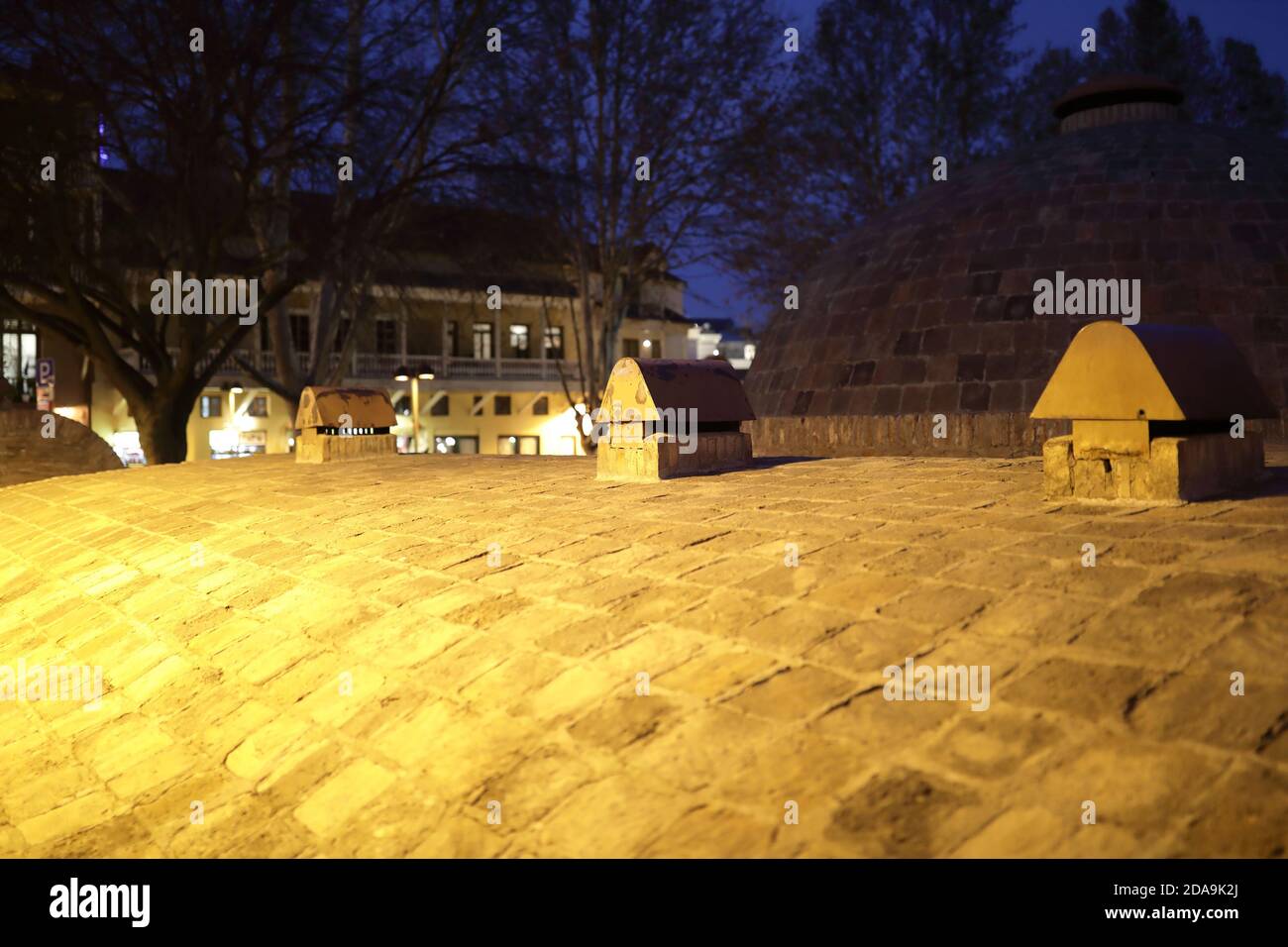 View of sulfur baths in Tbilisi at night Stock Photo - Alamy