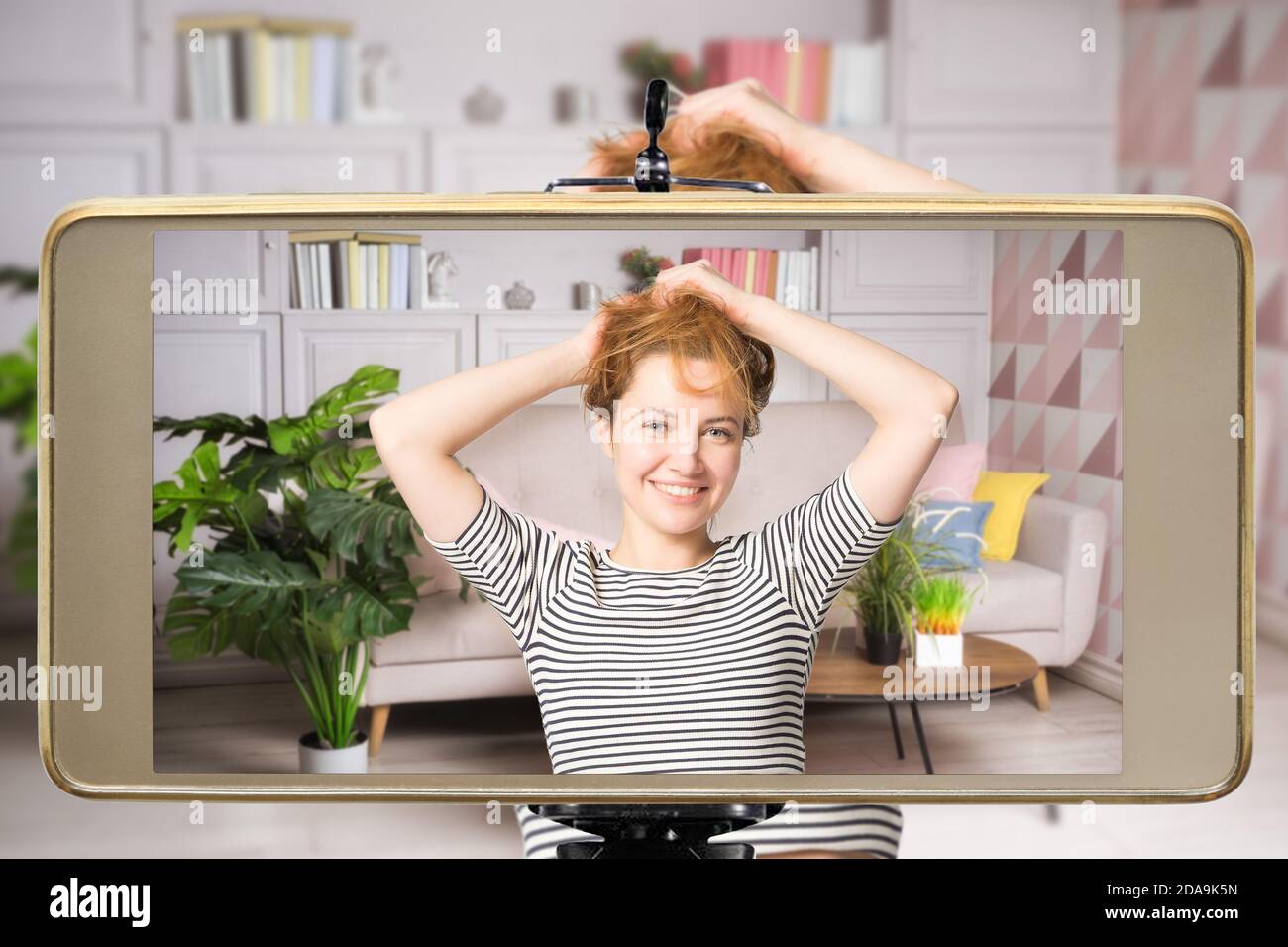 Young female blogger and online influencer live streaming on social ...