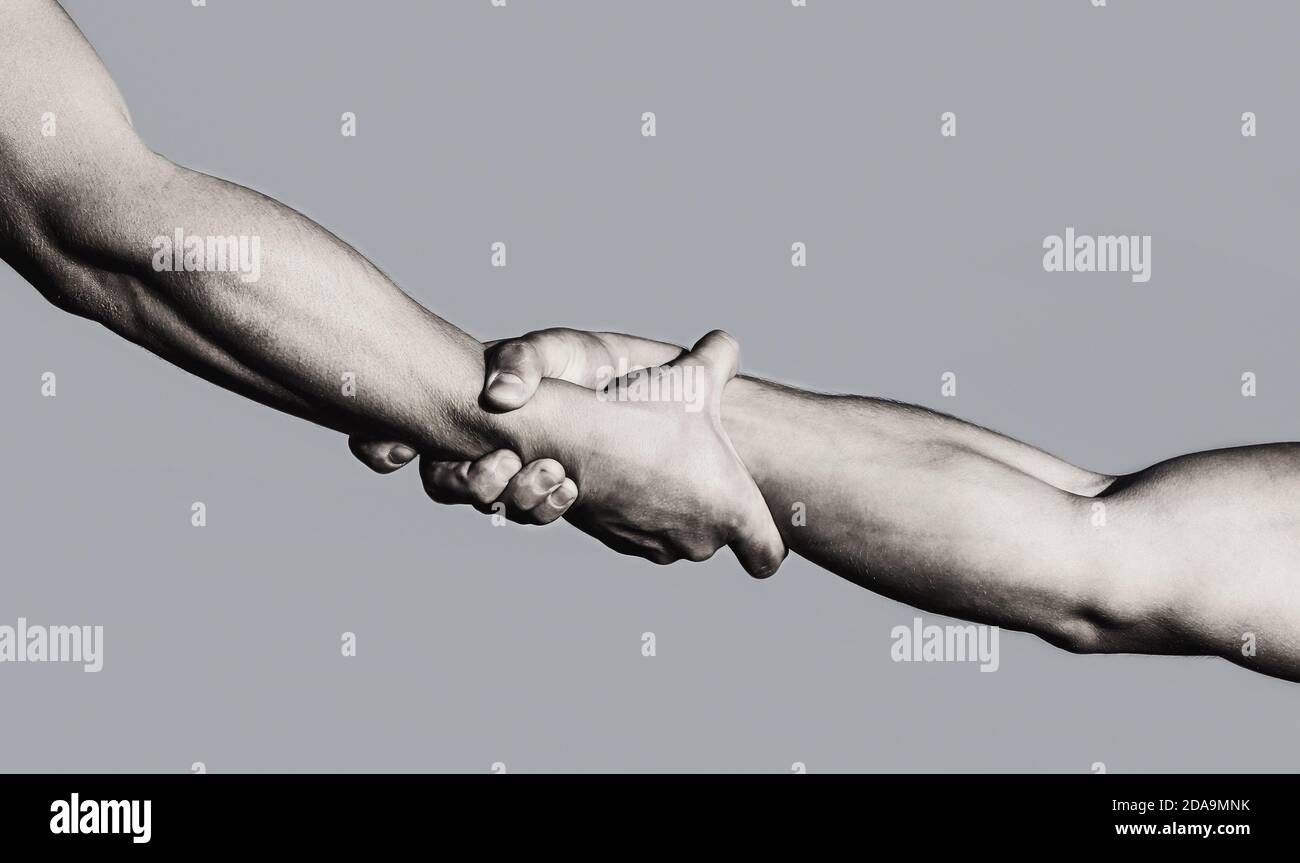 Hands of on blue sky background. Helping hand concept and international ...