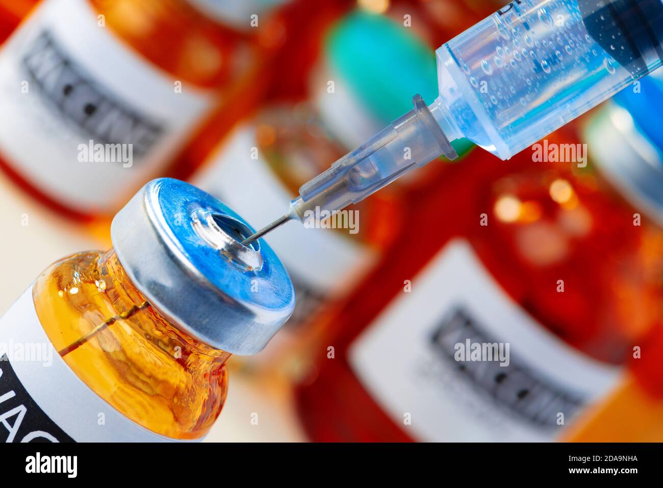Medical vial with medication and syringe close up Stock Photo - Alamy