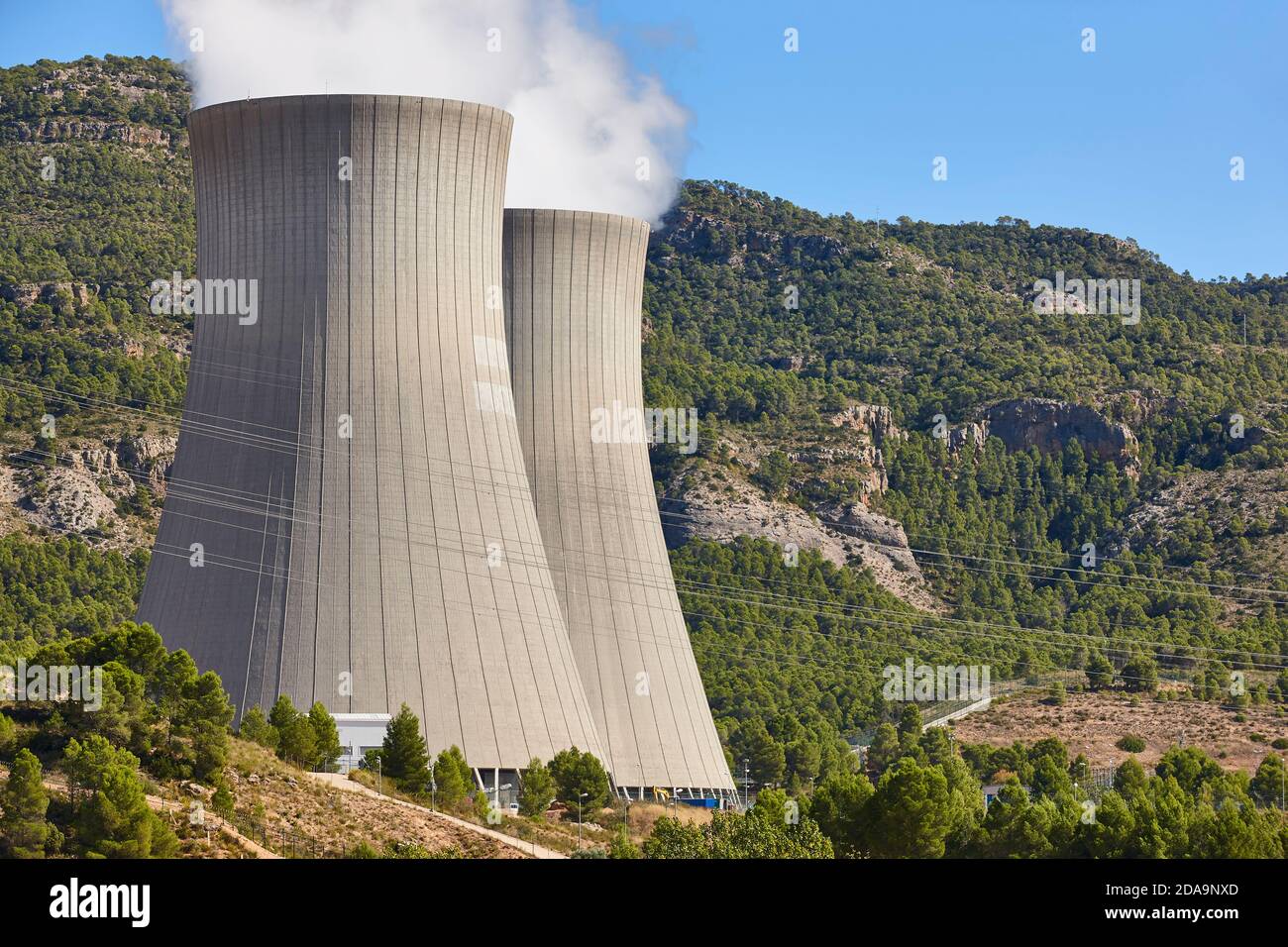 Nuclear power plant chimneys with steam. Sustainable energy Stock Photo ...