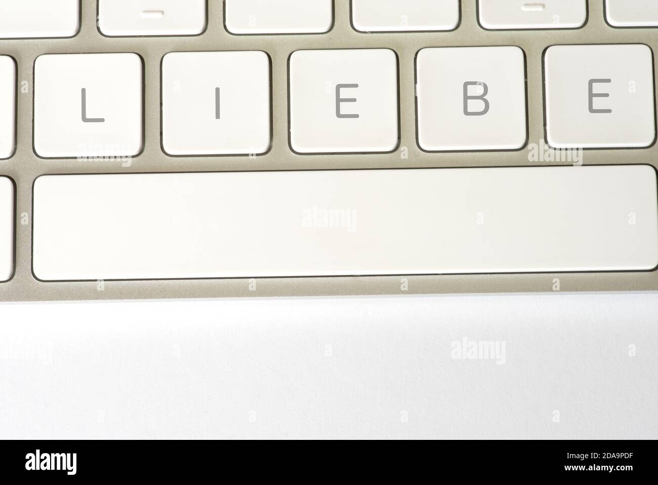 Computer and the word love Stock Photo - Alamy