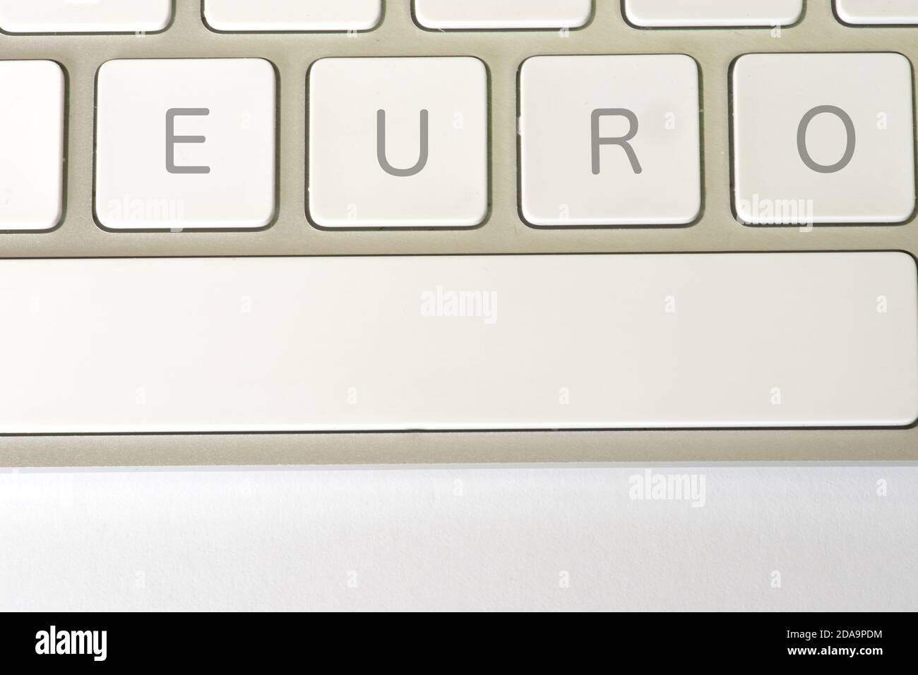 A computer, keyboard and euros Stock Photo - Alamy