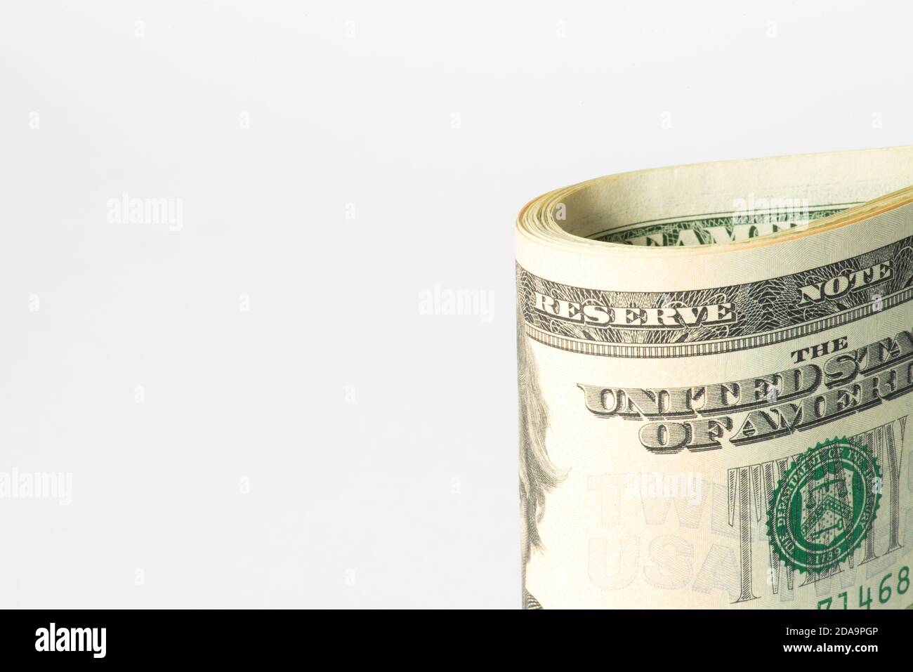 Dollar bank notes on a white background Stock Photo - Alamy