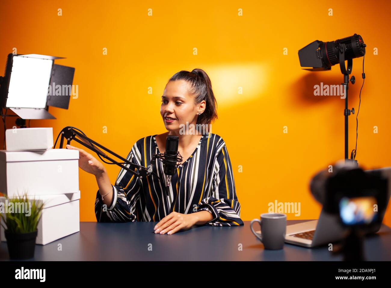 Podcast from vlogger with big giveaway gifts in home studio. Creative ...