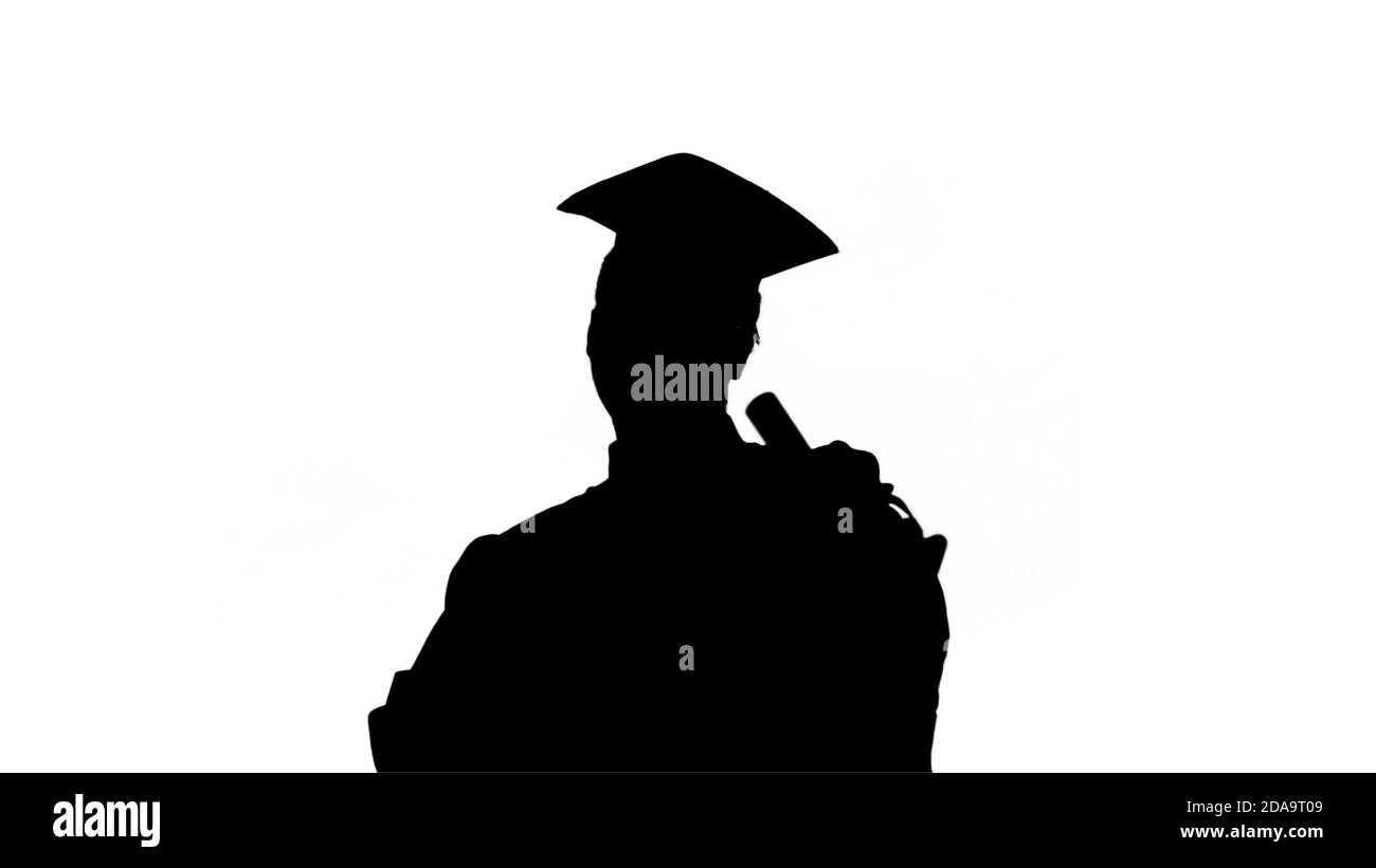 Silhouette Happy african american male student in graduation rob Stock ...