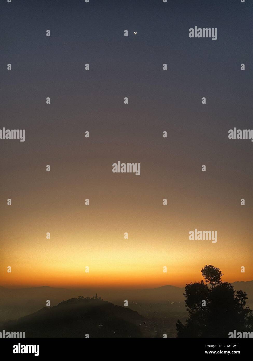 Kathmandu, Nepal. 11th Nov, 2020. A setting waning crescent moon along ...