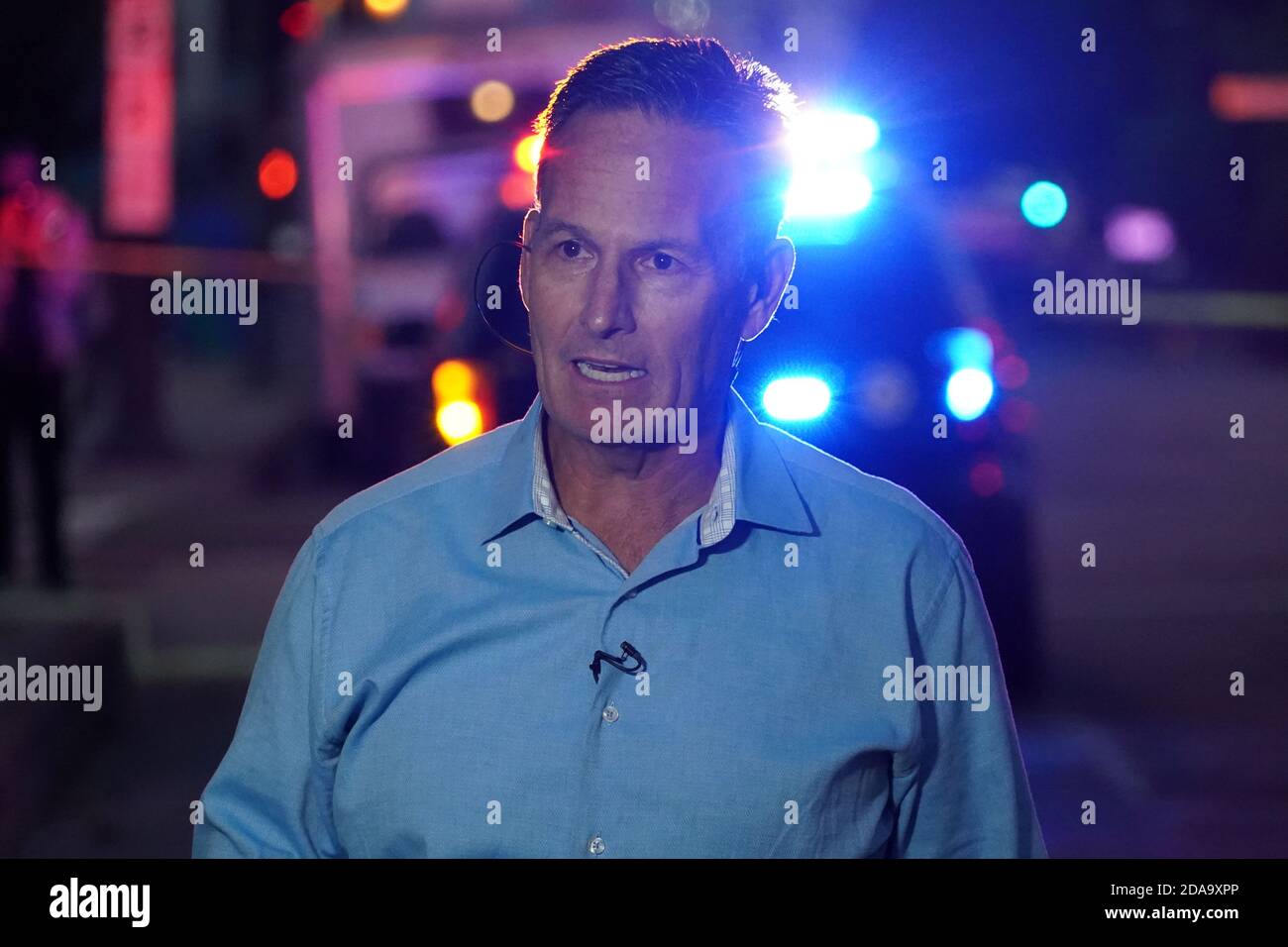Fox 11 News Los Angeles reporter Ed Laskos outside the gated Hall of ...