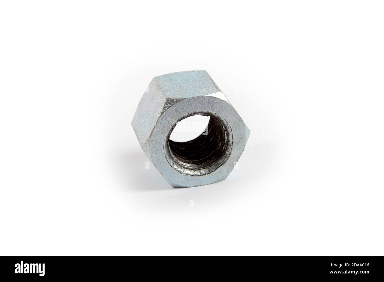 metal nut on white background Stock Photo - Alamy