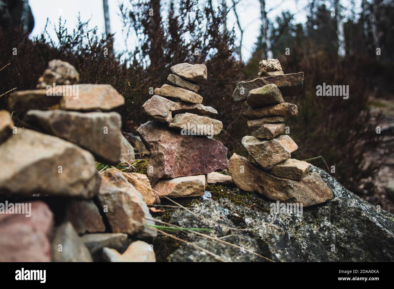 Stacked stones. Pyramid of different types of rocks. At Harz Mountains ...