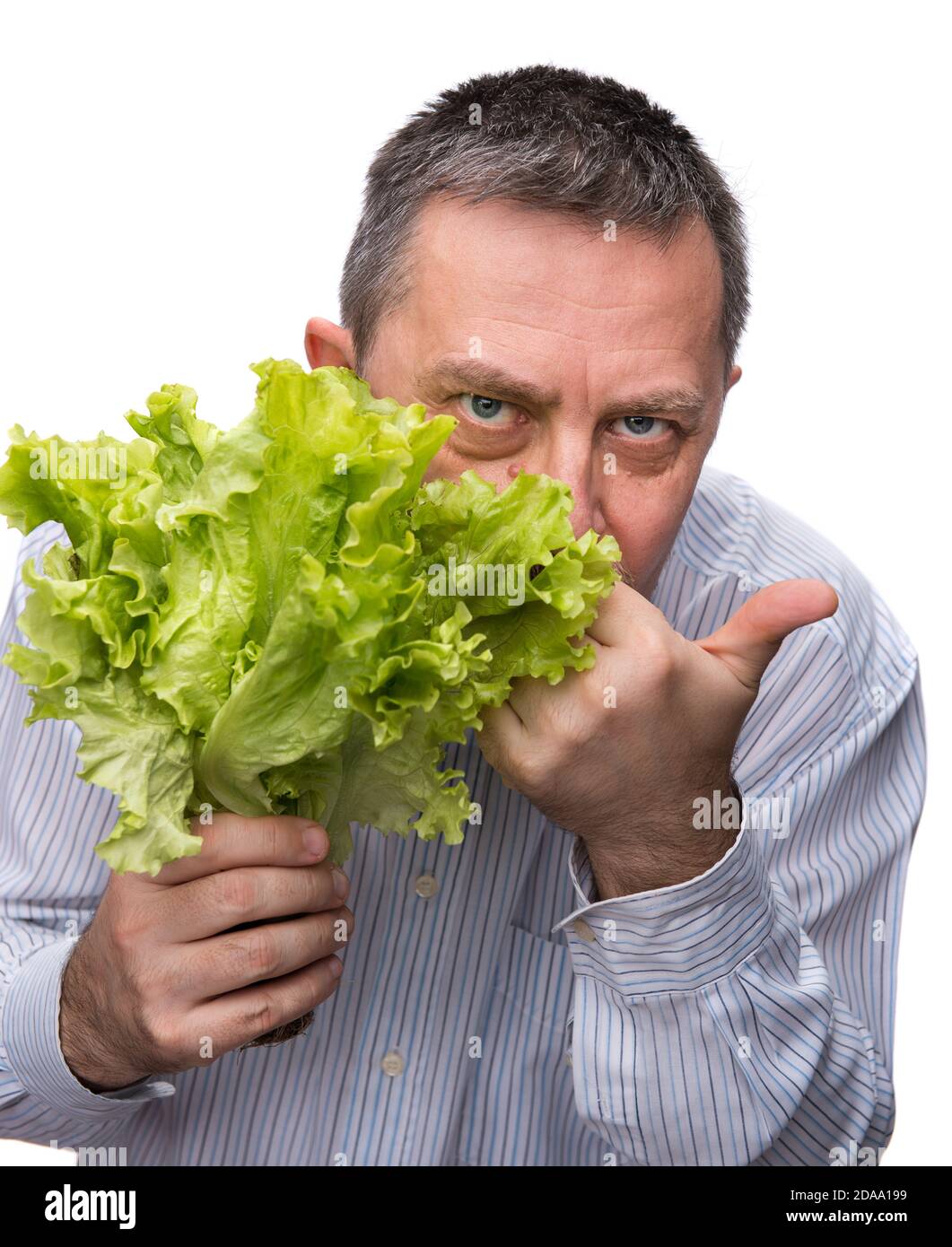Healthy food. Man holding lettuce isolated on white Stock Photo - Alamy