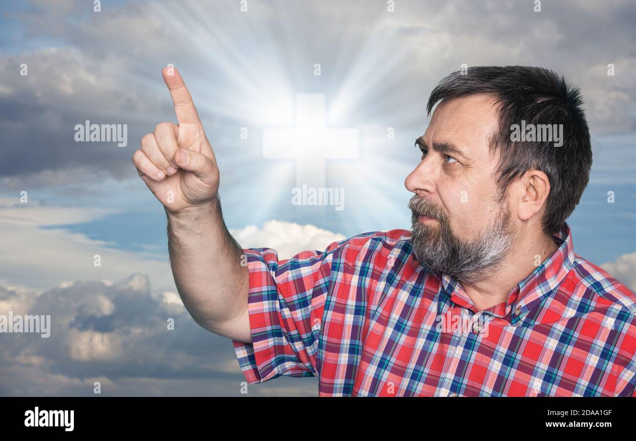 Hand with finger pointing to heaven hi-res stock photography and images ...
