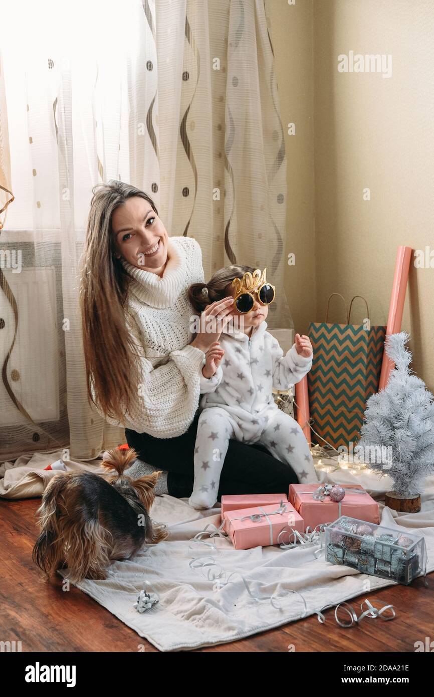 Christmas celebration in new normal. Family celebrating Christmas in ...