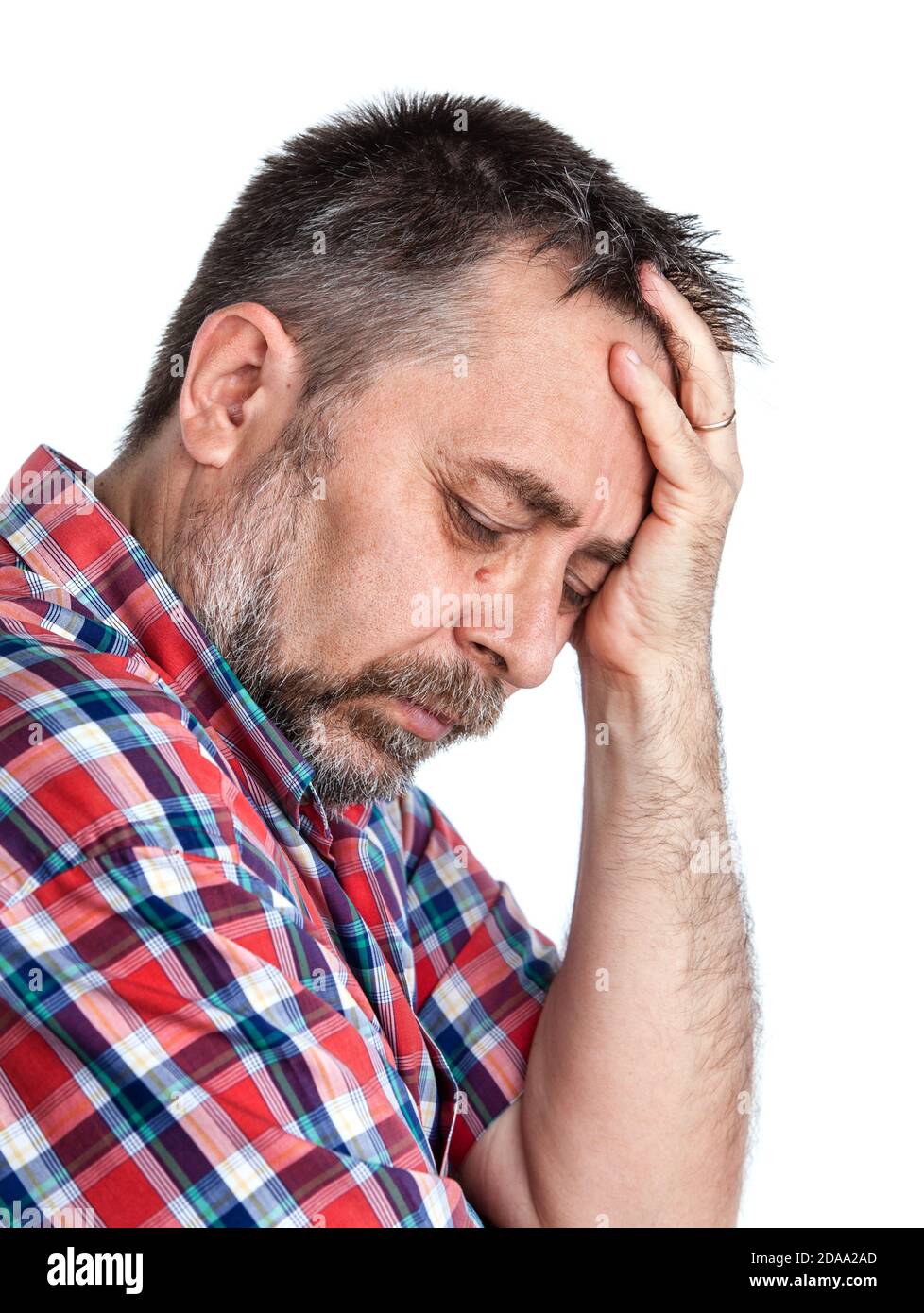 Headache. Portrait of an middle age man with face closed by hand ...