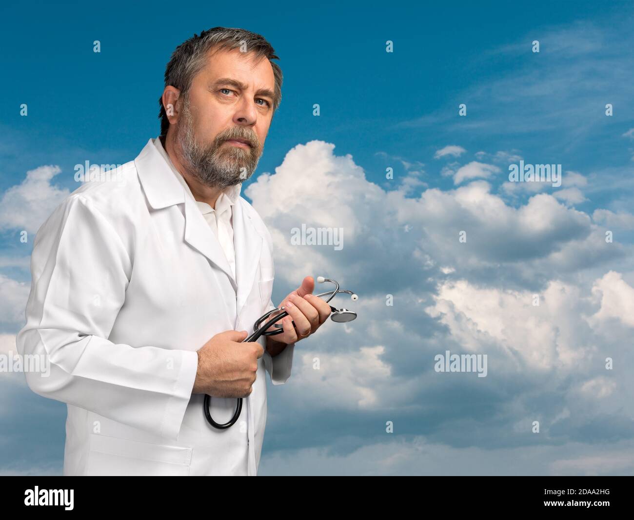 Health care concept. Medical doctor with stethoscope against blue ...