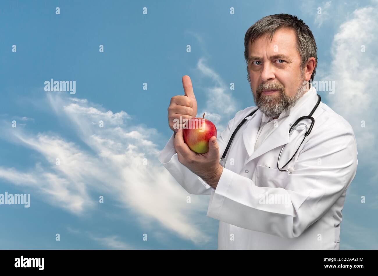 Good diet and healthy lifestyle concept. Doctor advises apple for ...