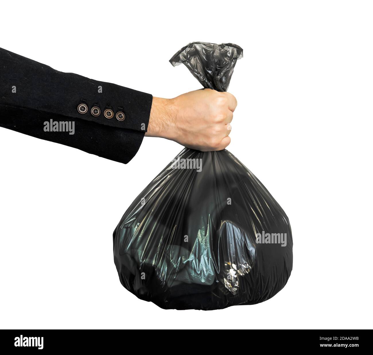a black garbage bag in a man's hand is isolated on a white background ...