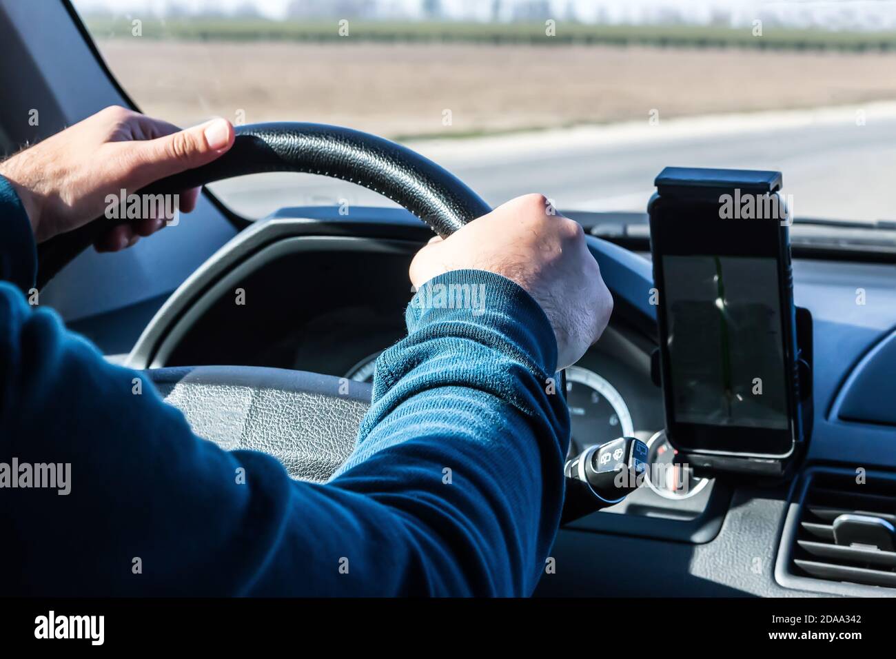 Drivers hand holding steering wheel hi-res stock photography and images ...