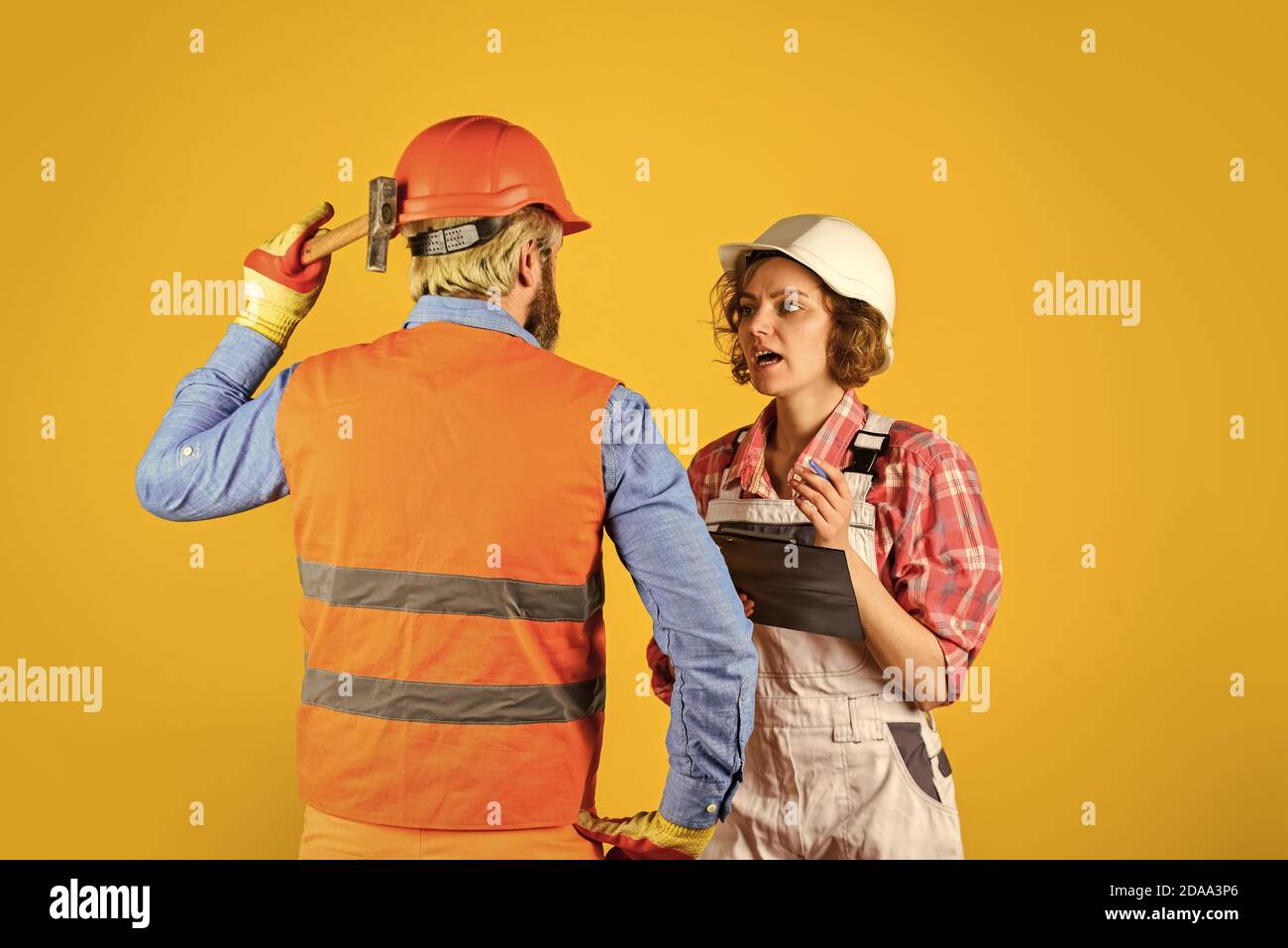 teamwork. family standing inside house under construction. renovation ...