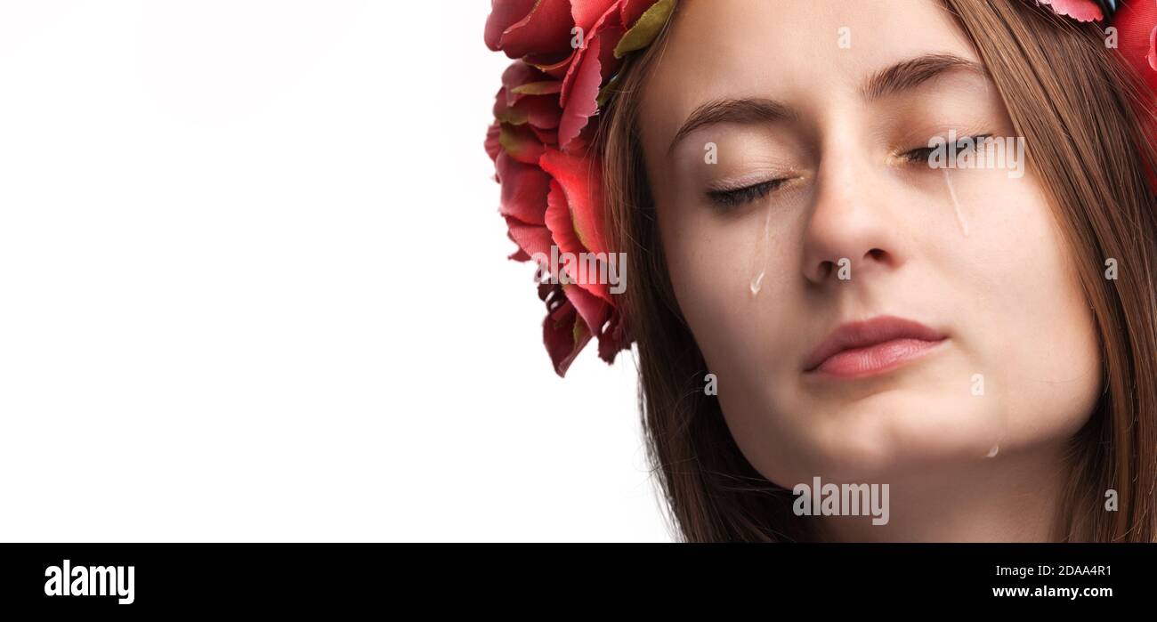 Close-up portrait of beautiful crying girl with tears on her cheeks ...