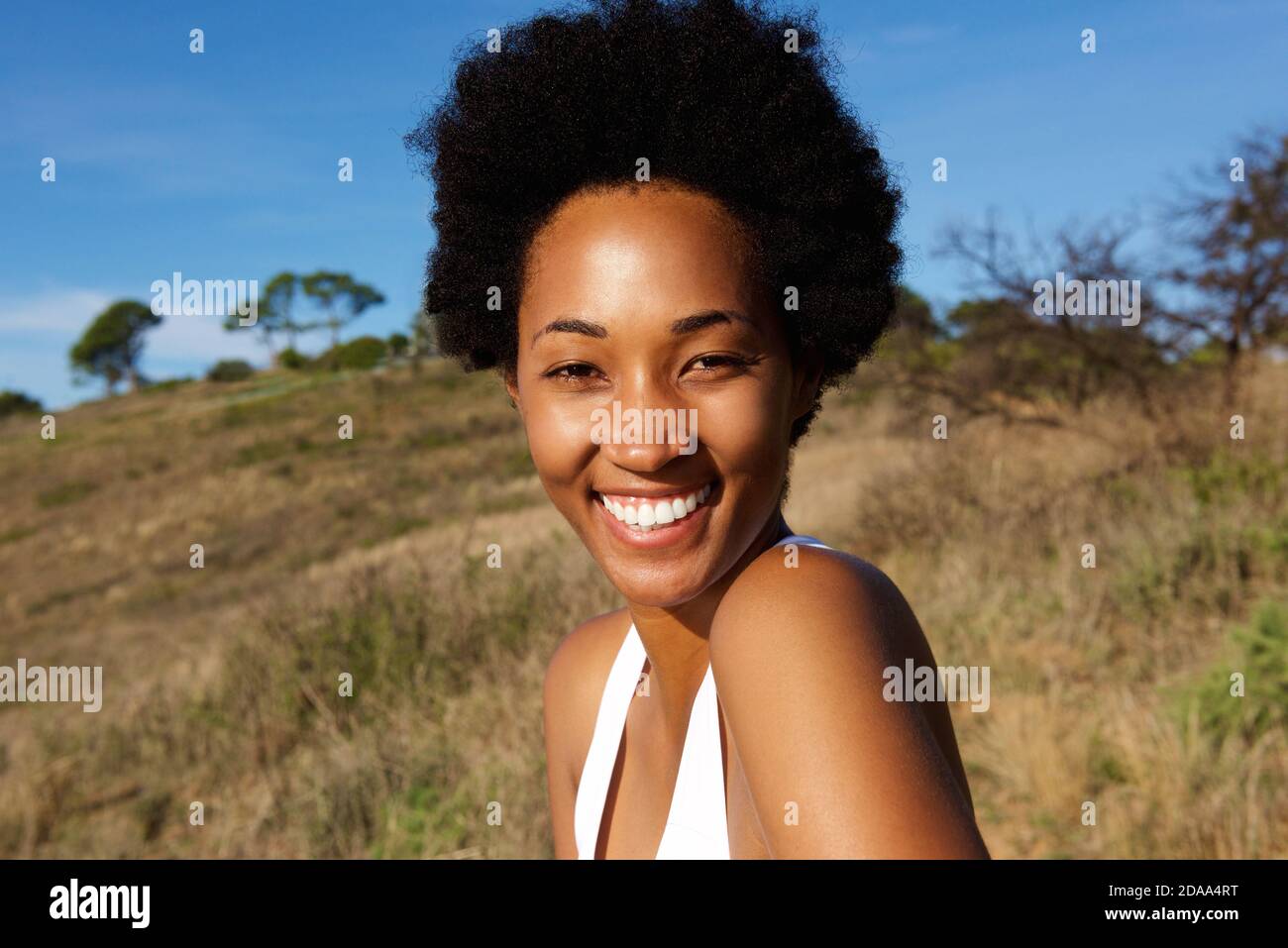 Close up portrait of attractive young african female runner standing ...