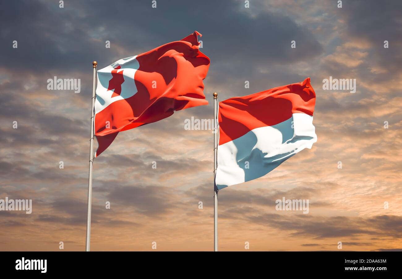 Beautiful national state flags of Tonga and Indonesia together at the ...