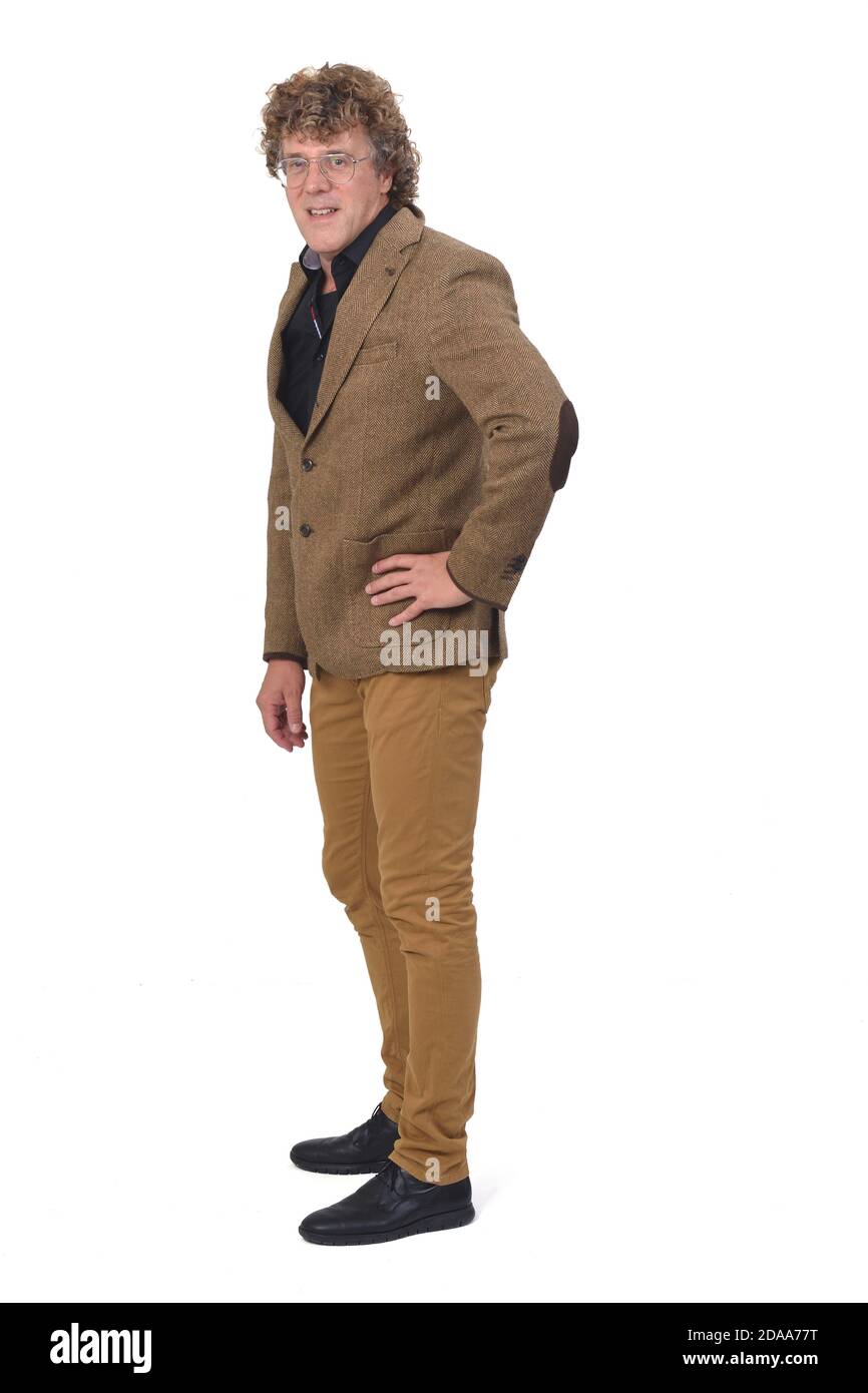 side view of middle aged man with blazer on white background, hand on ...