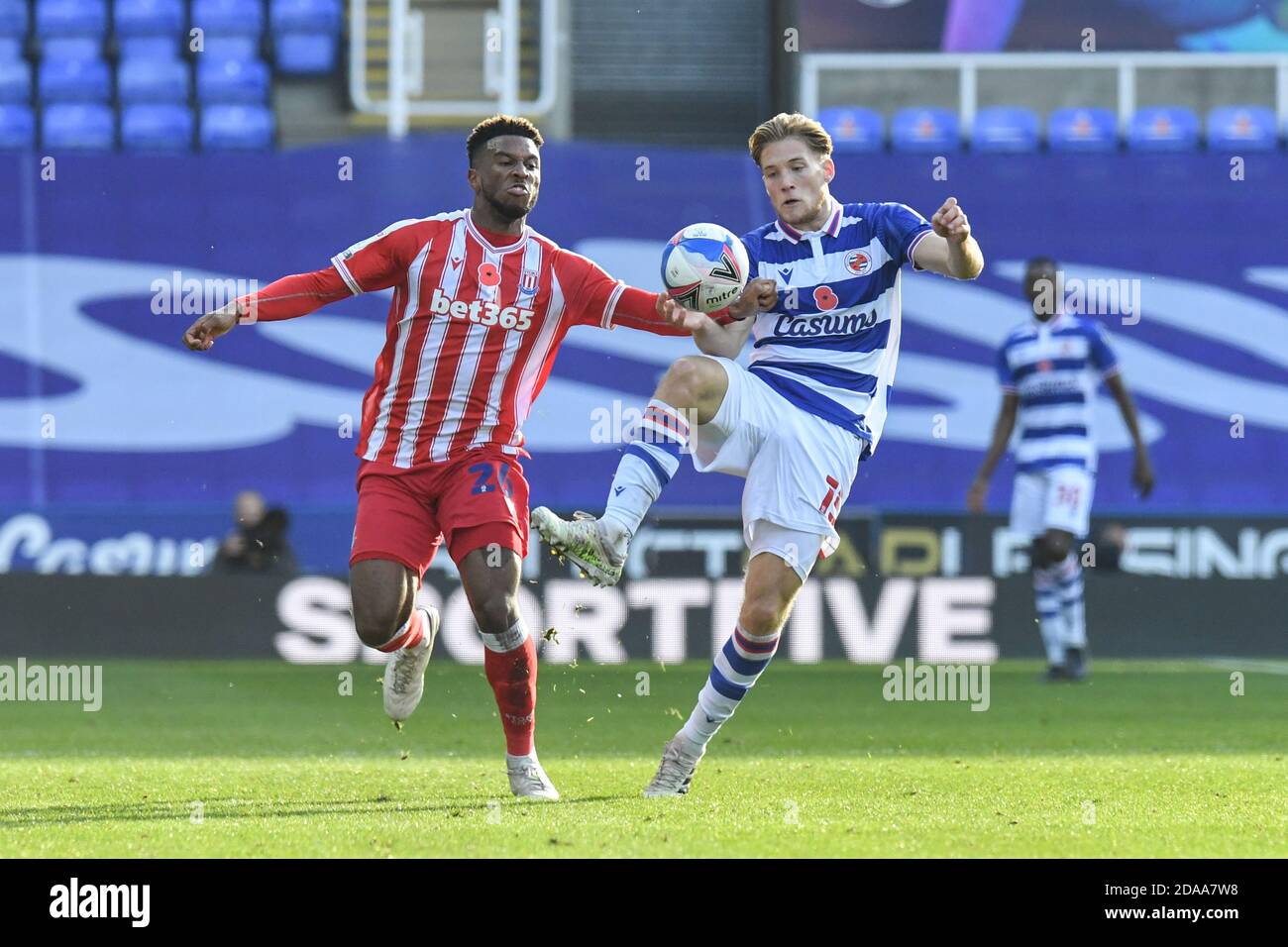 Tyrese Campbell #26 of Stoke City and Lewis Gibson #15 of Reading ...
