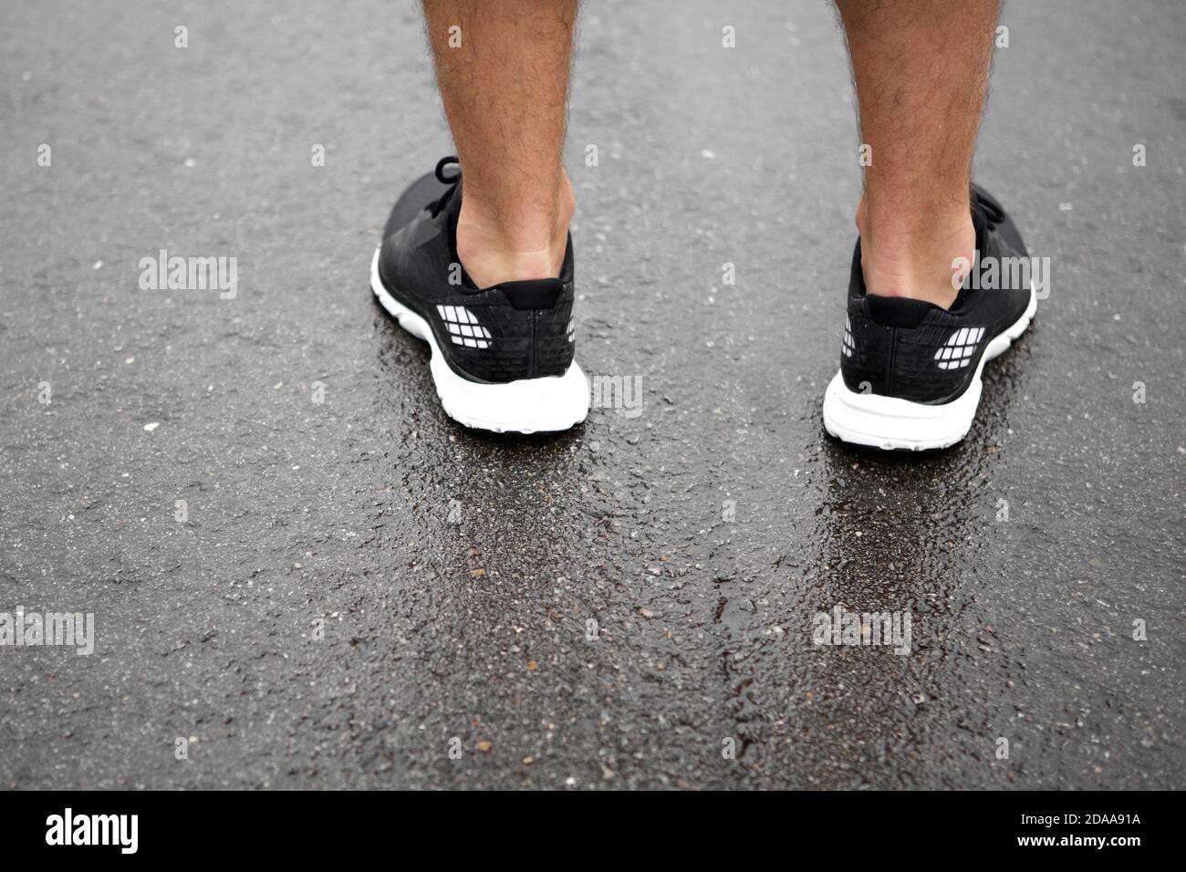 Close up portrait of sporty shoes on pavement Stock Photo - Alamy