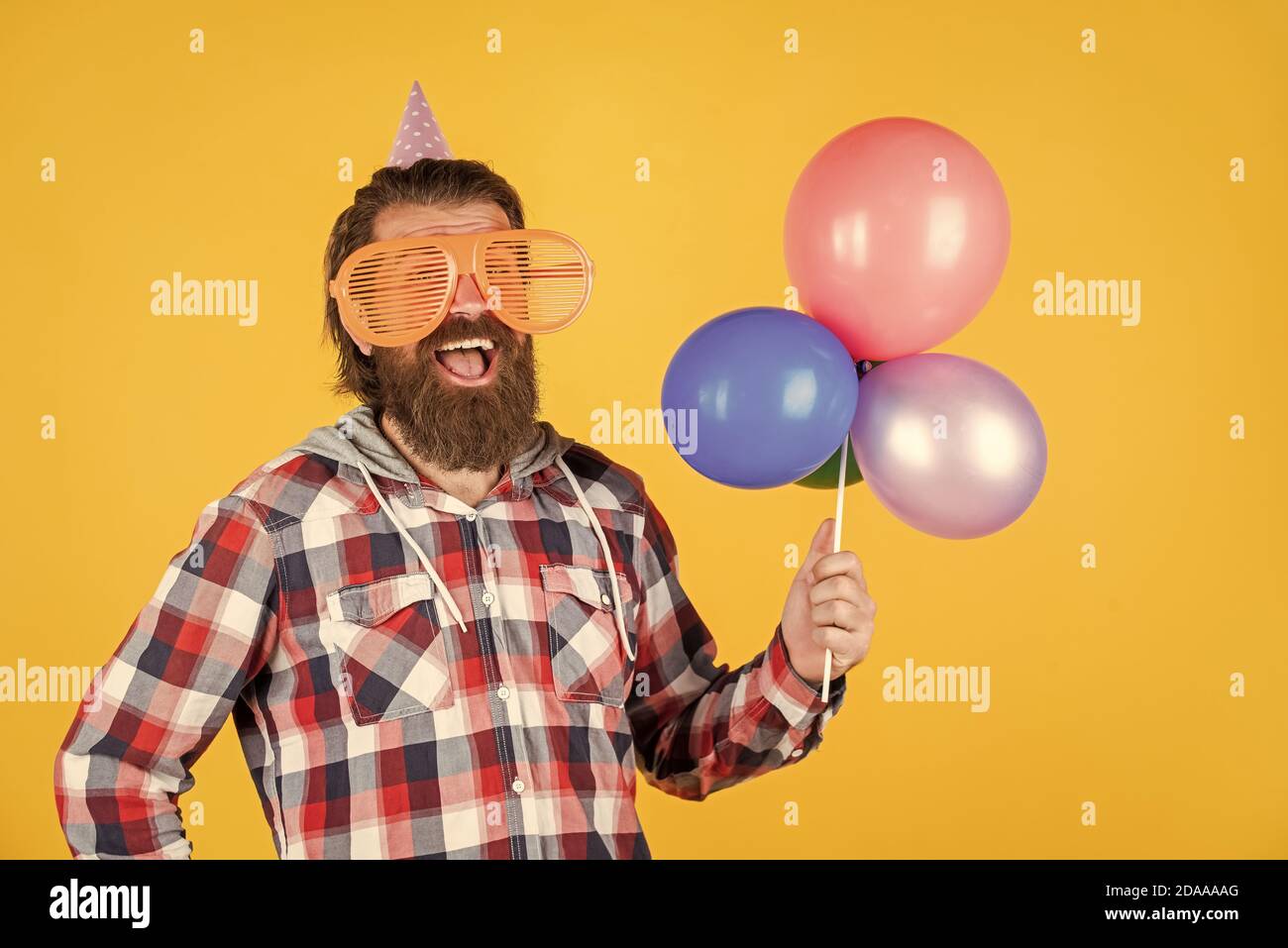 Looking good. funny man in birthday hat. happy holiday celebration ...