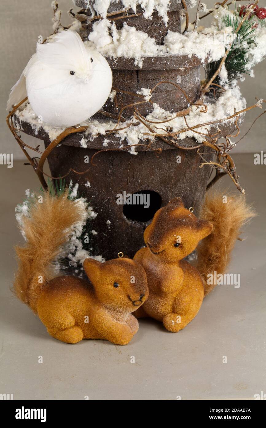 Squirrels figurines and snowy birdhouse as decoration for Christmas ...