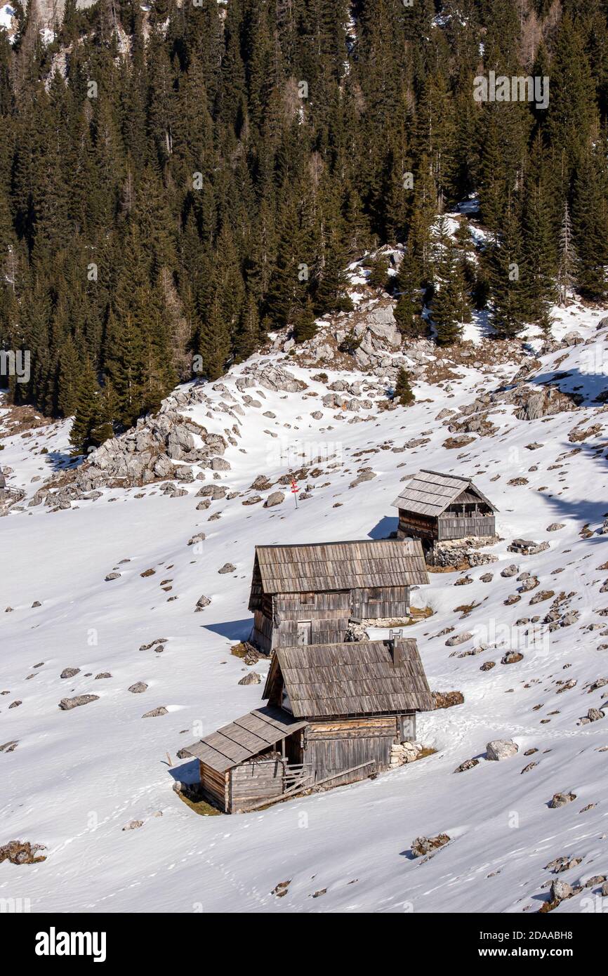 Mountain huts covered in snow Stock Photo - Alamy
