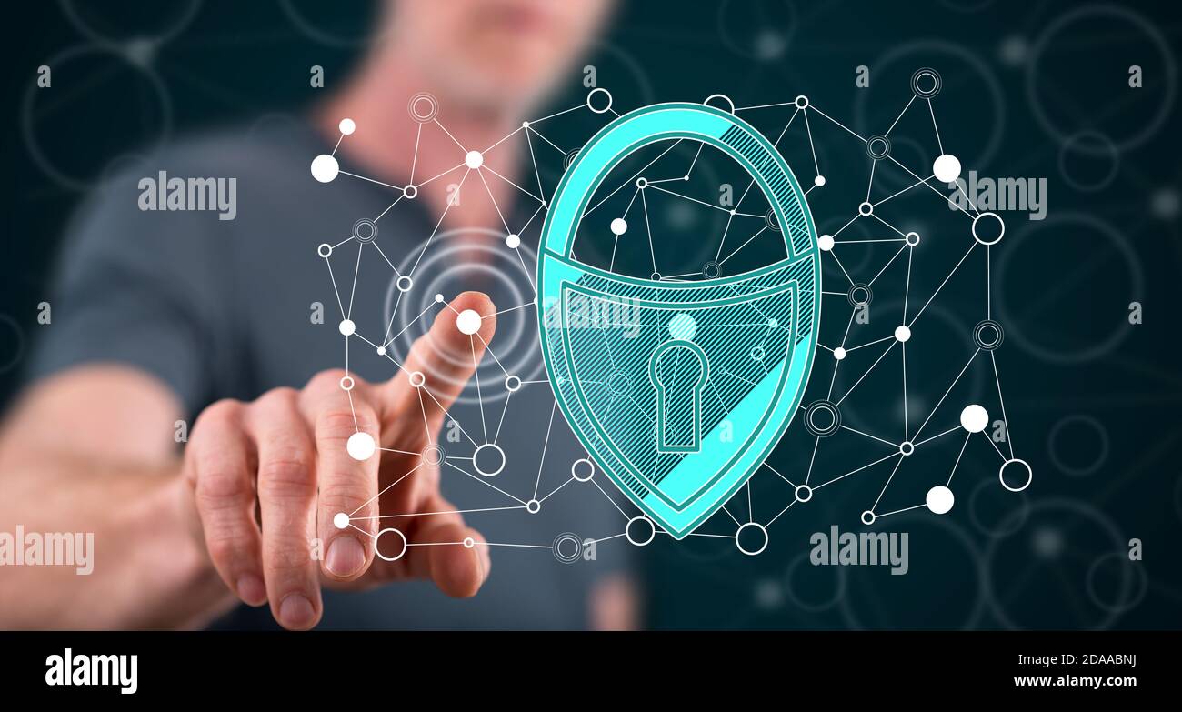 Man touching a network safety concept on a touch screen with his finger ...