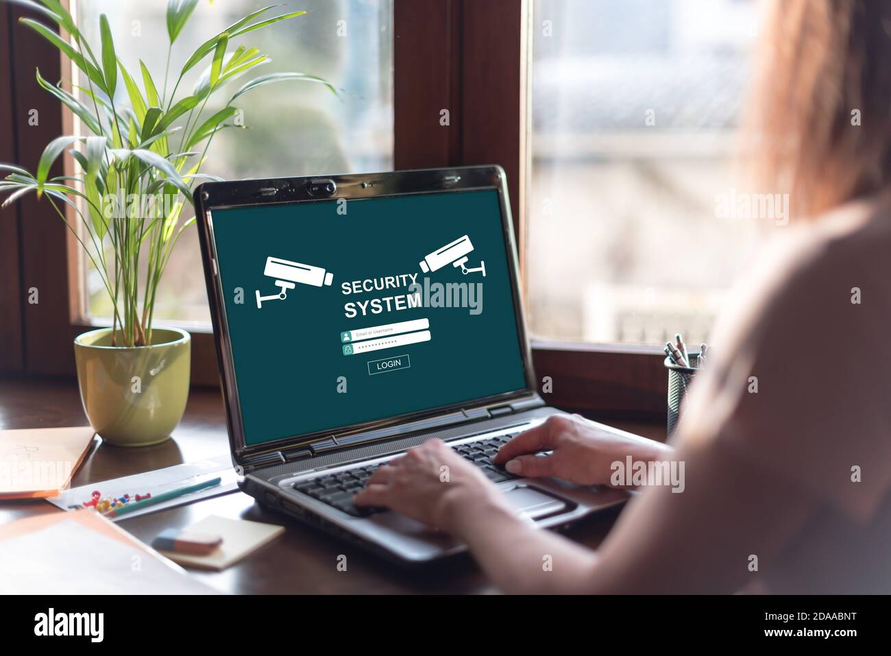 Laptop screen displaying a security system concept Stock Photo - Alamy