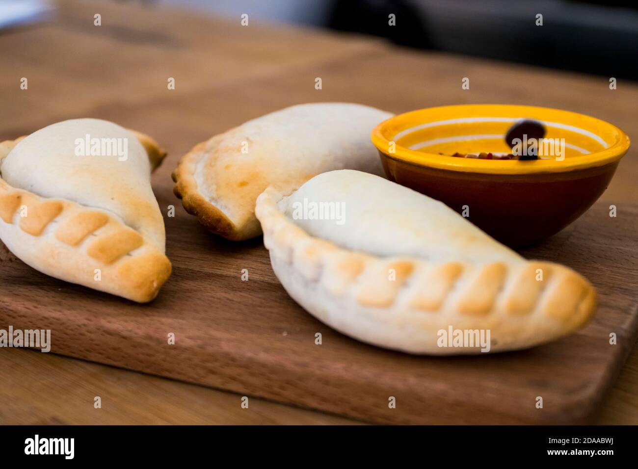 Traditional baked Argentine empanadas savory pastries with meat beef ...