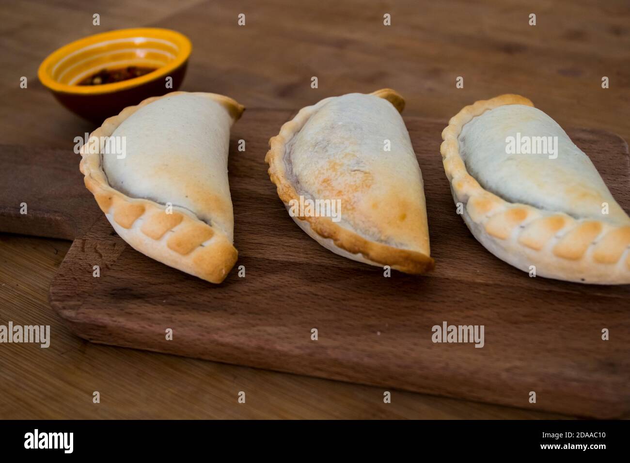 Traditional baked Argentine empanadas savory pastries with meat beef ...