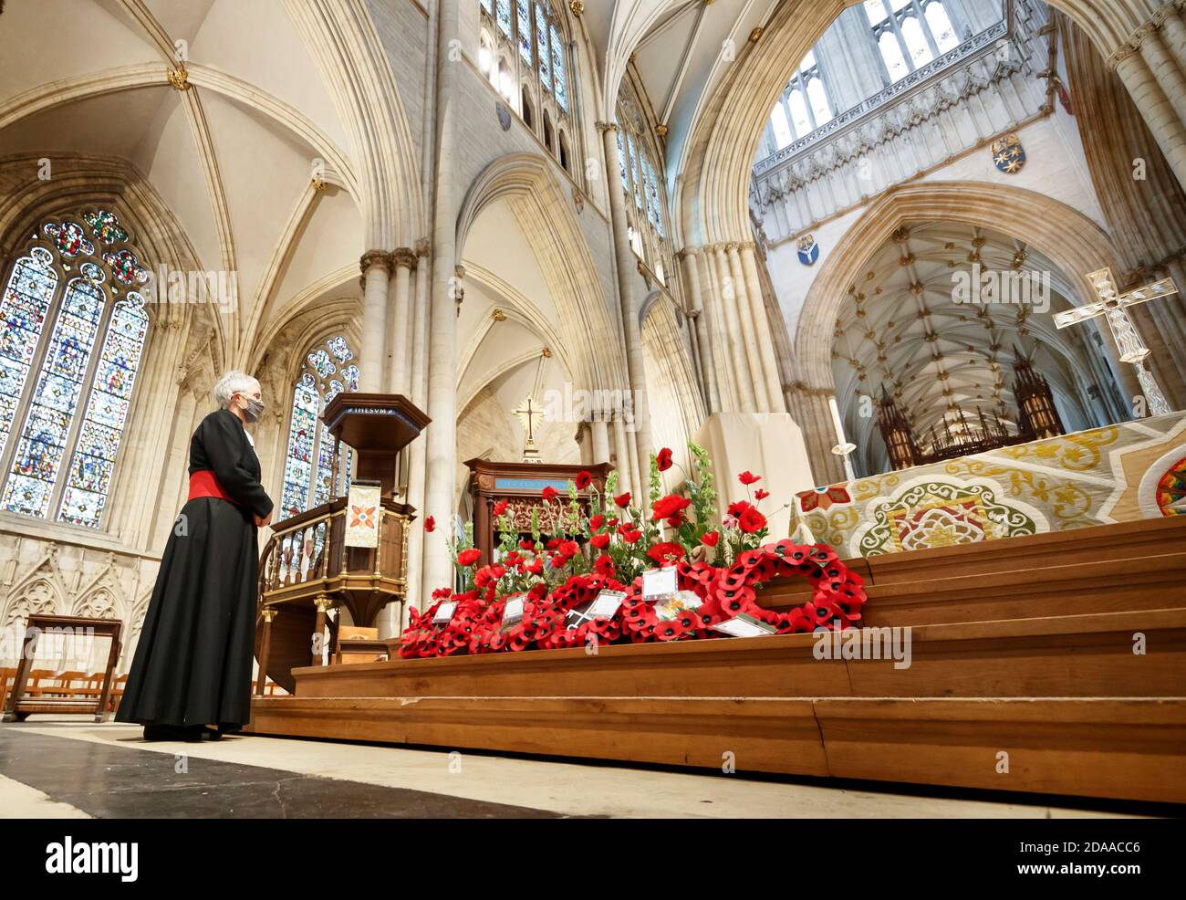 The Revd Maggie McLean, York Minster's Canon Missioner, observes a two ...