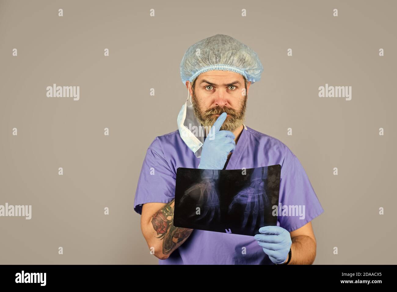 Fracture and bone damage. Doctor compares results. X ray radiation ...