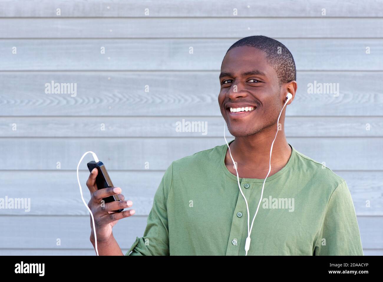 Handsome african american man listening hi-res stock photography and images - Alamy