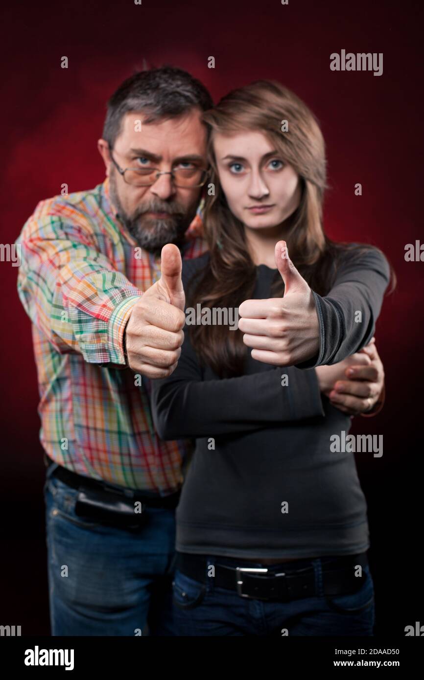 Father and daughter show OK symbol. Focus on hands Stock Photo - Alamy