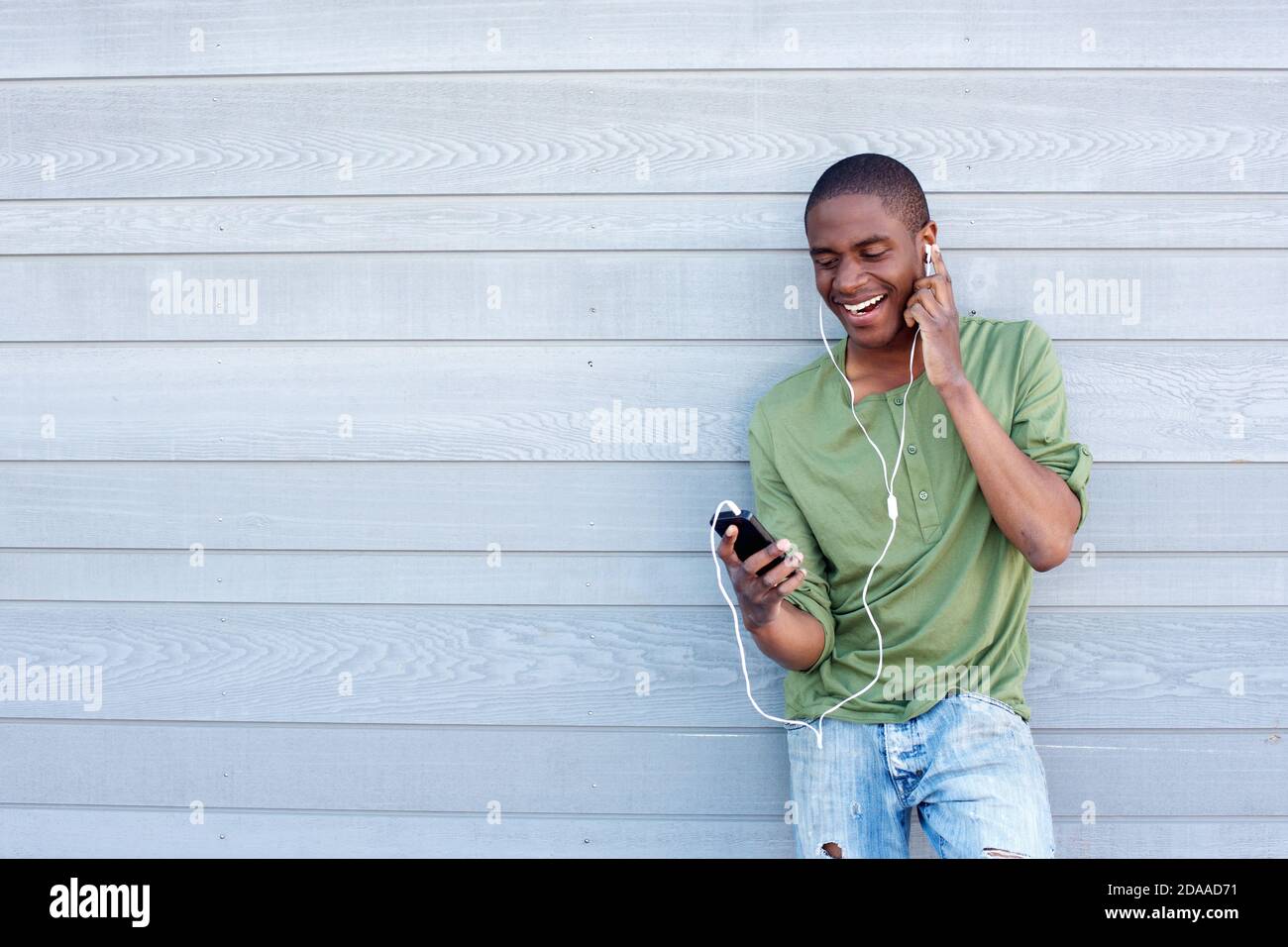 African male smiling listening hi-res stock photography and images - Alamy