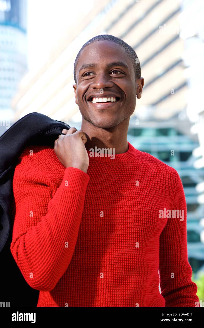 Man holding jacket over shoulder hi-res stock photography and images ...